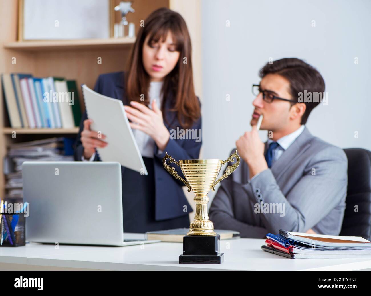 The concept of teamwork with prize Stock Photo - Alamy