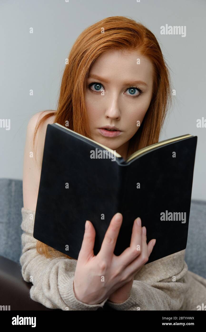 Open book sits hi-res stock photography and images - Alamy