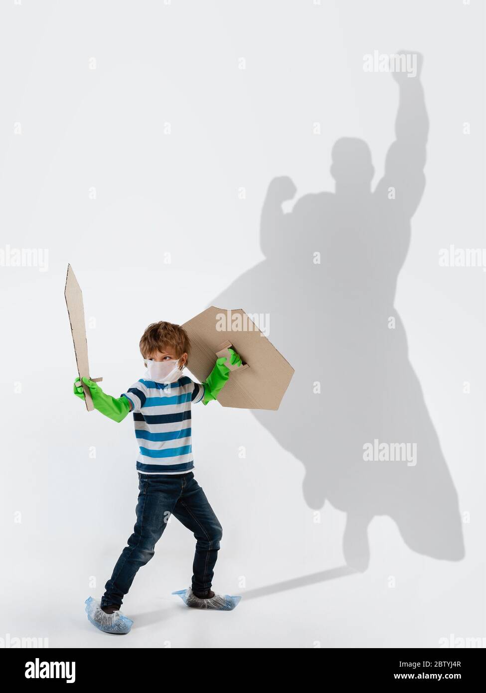 Superhero in shadow of ordinary people - modern superhero's concept ...