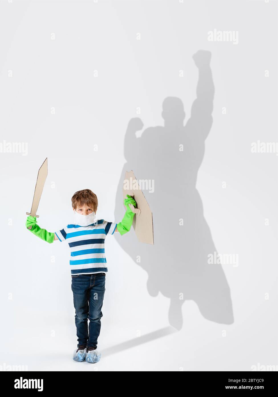 Superhero in shadow of ordinary people - modern superhero's concept ...