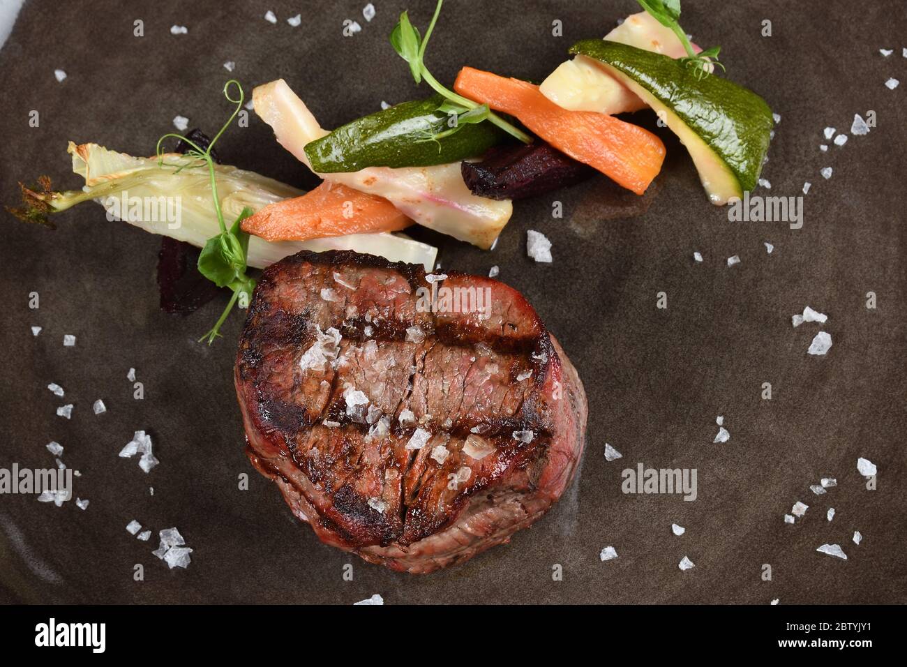 Rib eye steak, seasonal vegetables and sweet potatoes Fries in the ...