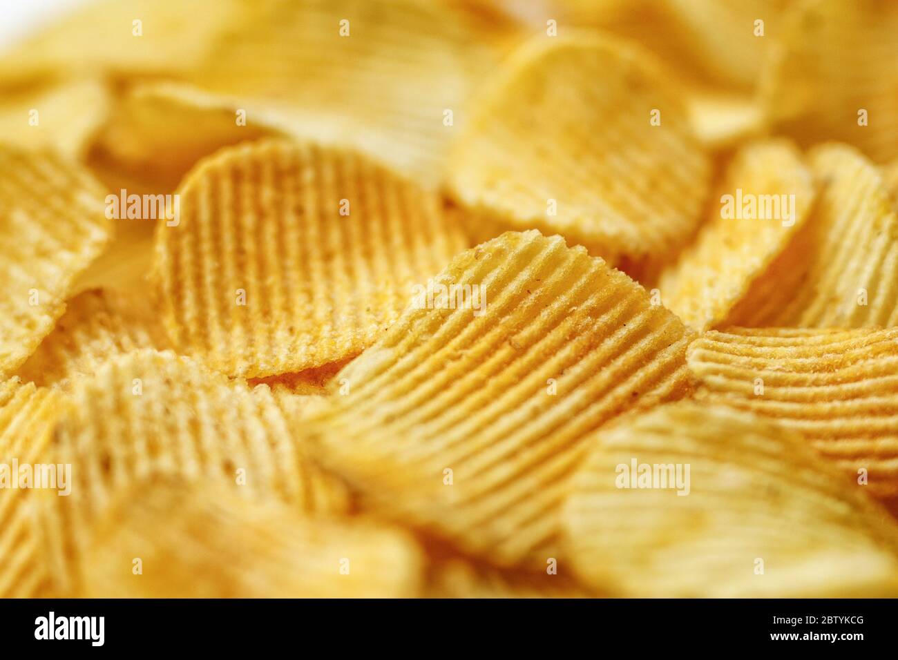 Corrugated Potato Chips. Close-up macro view Stock Photo - Alamy