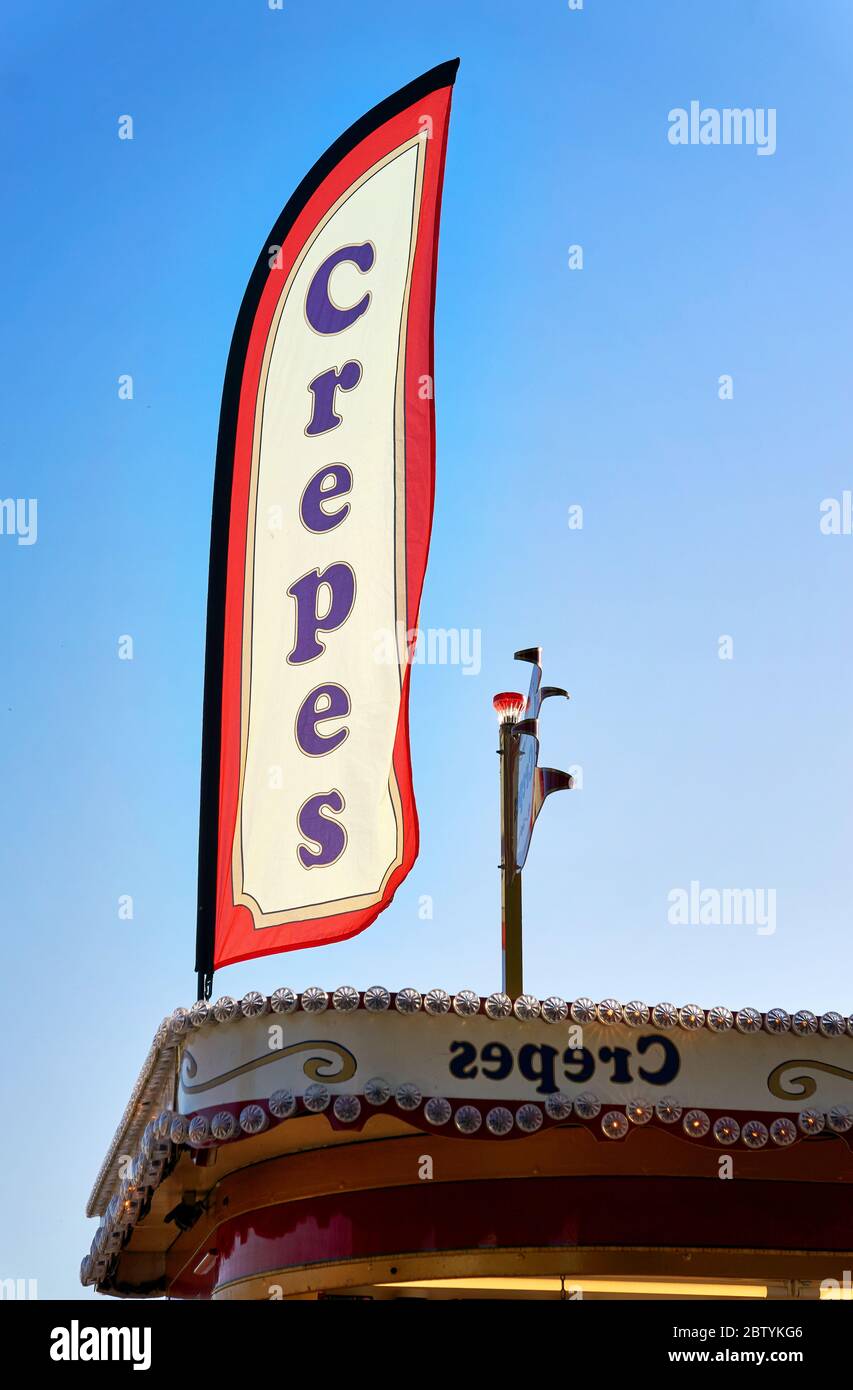 Crepes advertising a snack on a flag Stock Photo - Alamy