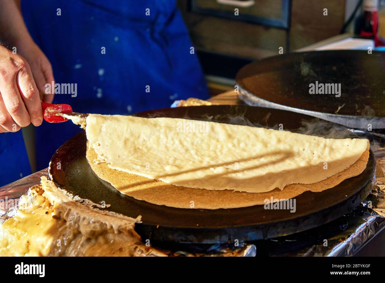 Making delicious crepe on hot hi-res stock photography and images - Alamy