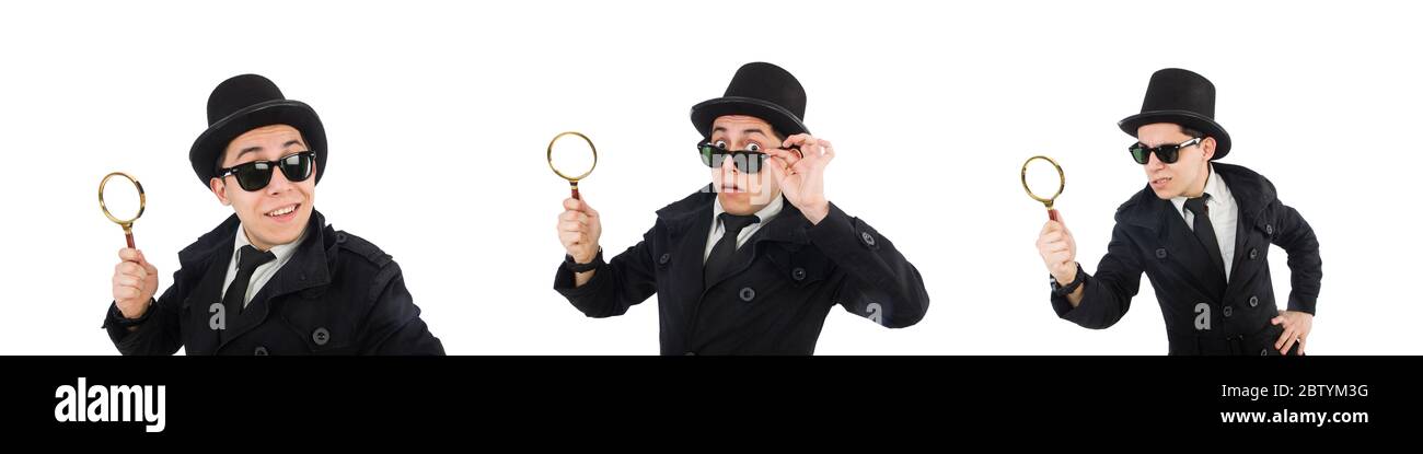 The young detective in black coat holding magnifying glass isolated ...