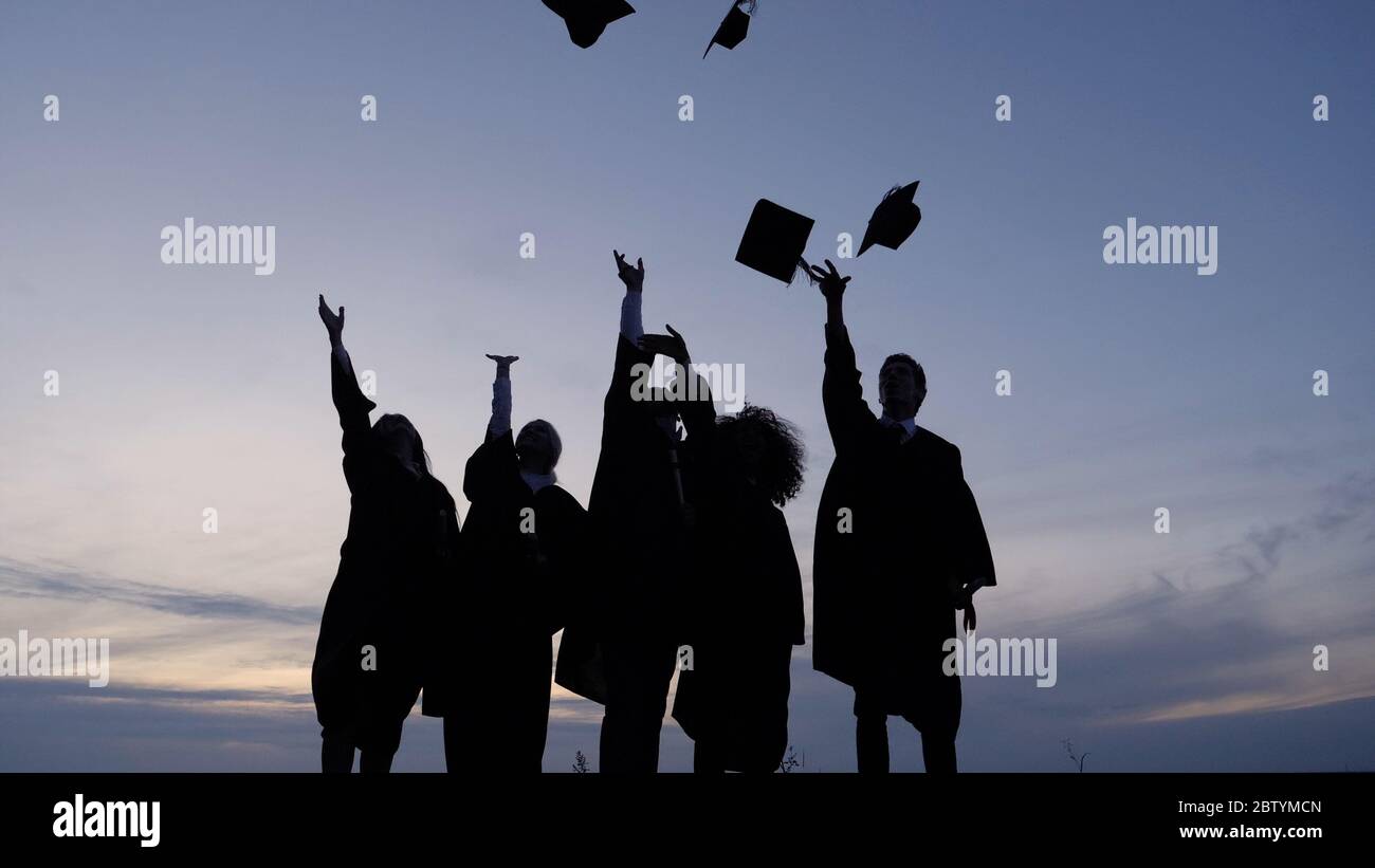 Silhouette of Diverse International Students Celebrating Graduat Stock ...