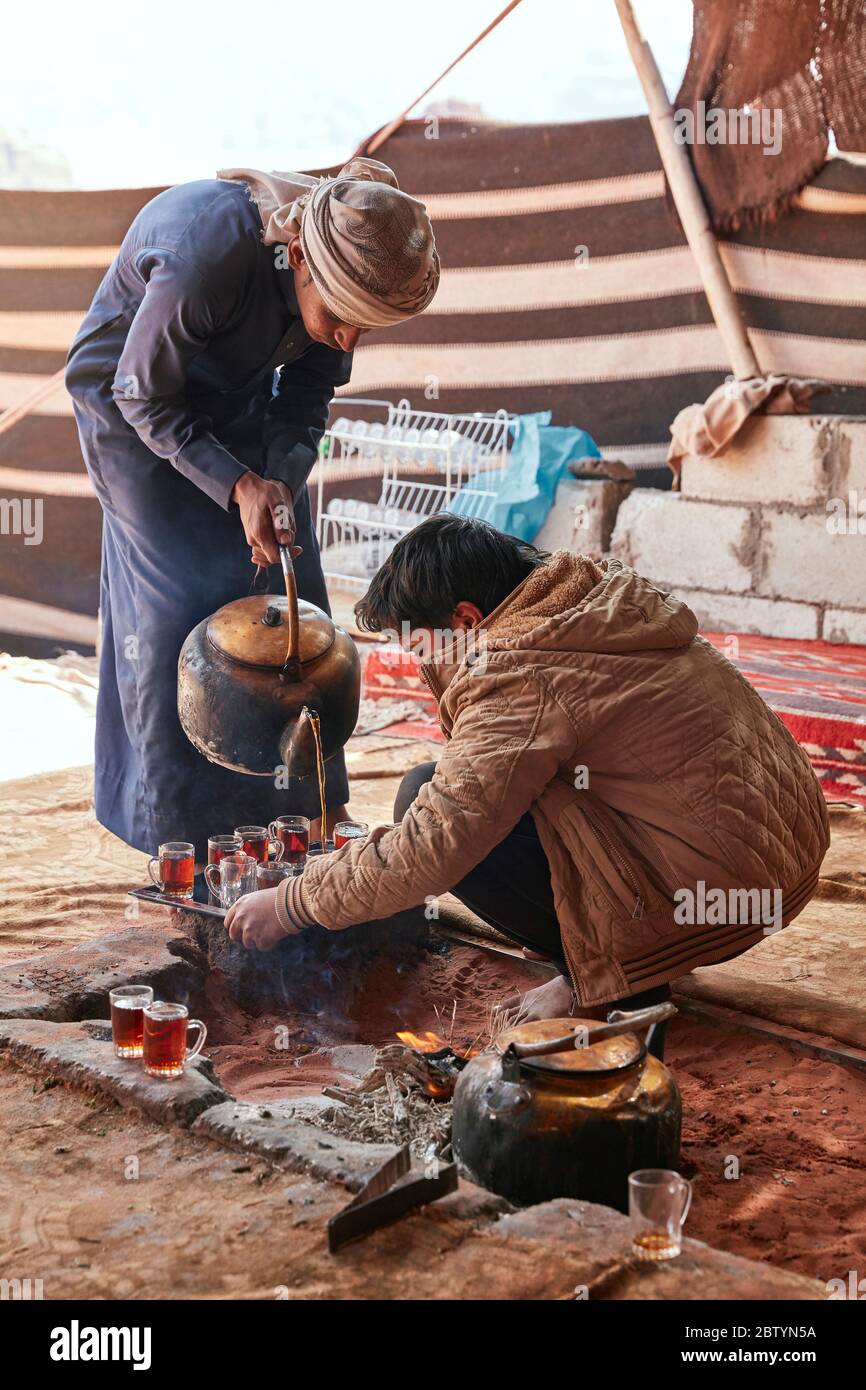 Serving tea in traditional bedouin camp, Wadi Rum desert, Aqaba, Jordan ...