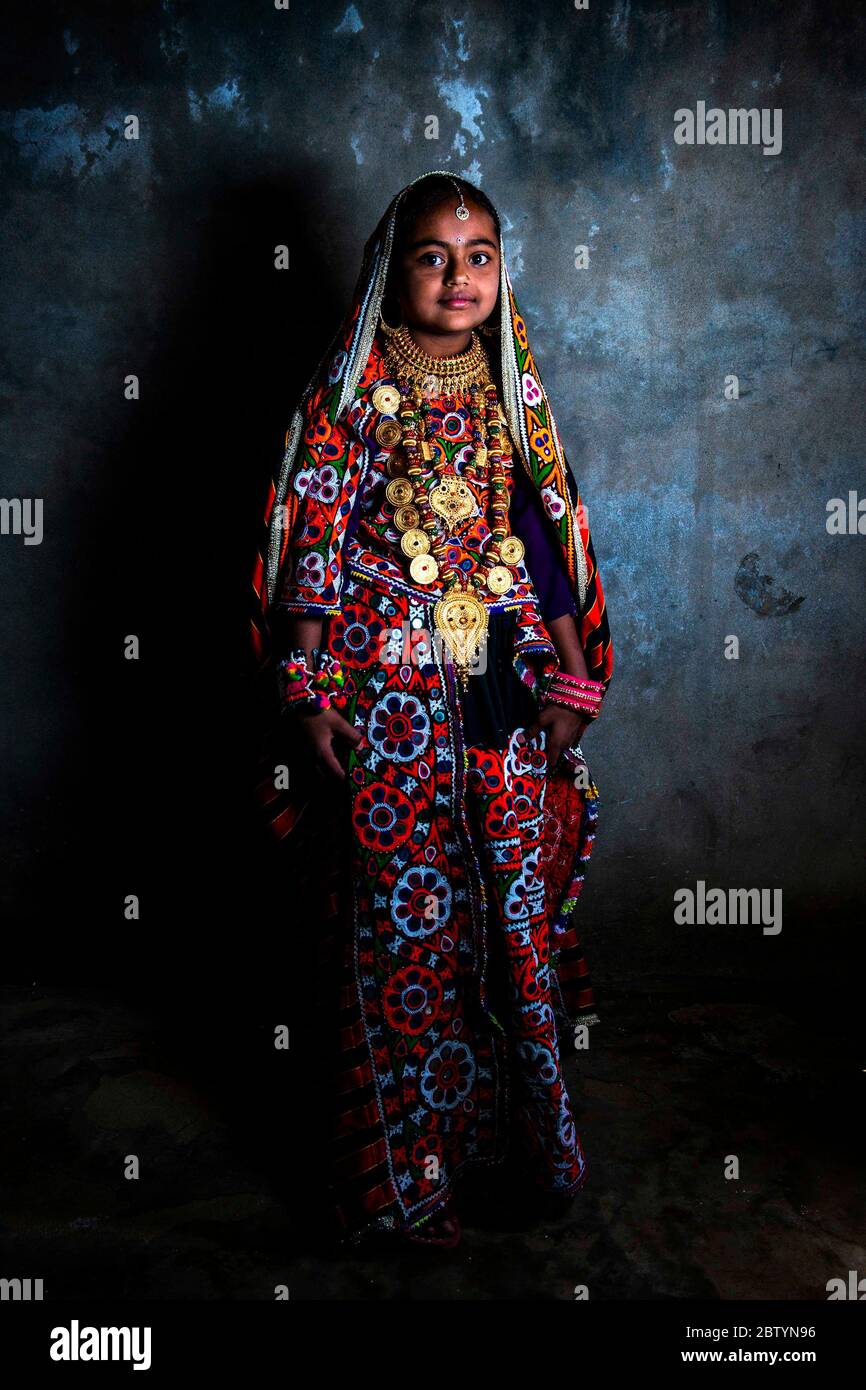A young girl from the Ahir tribe, who live in the Satapar village ...