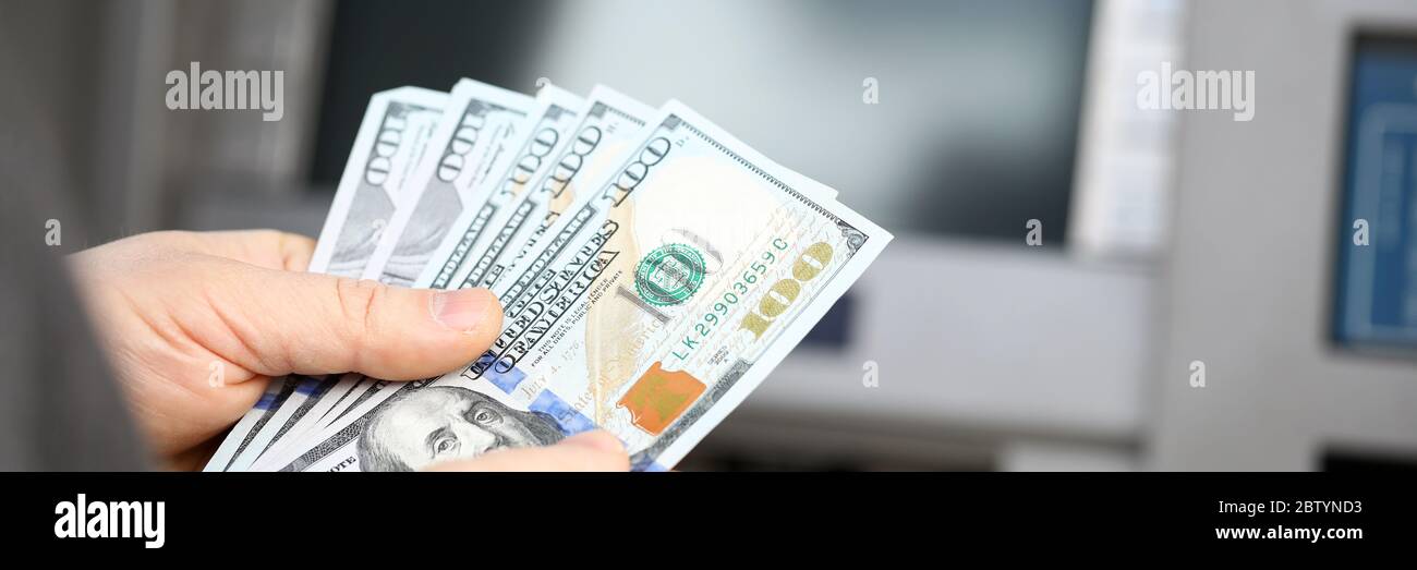 Successful male holding salary Stock Photo - Alamy