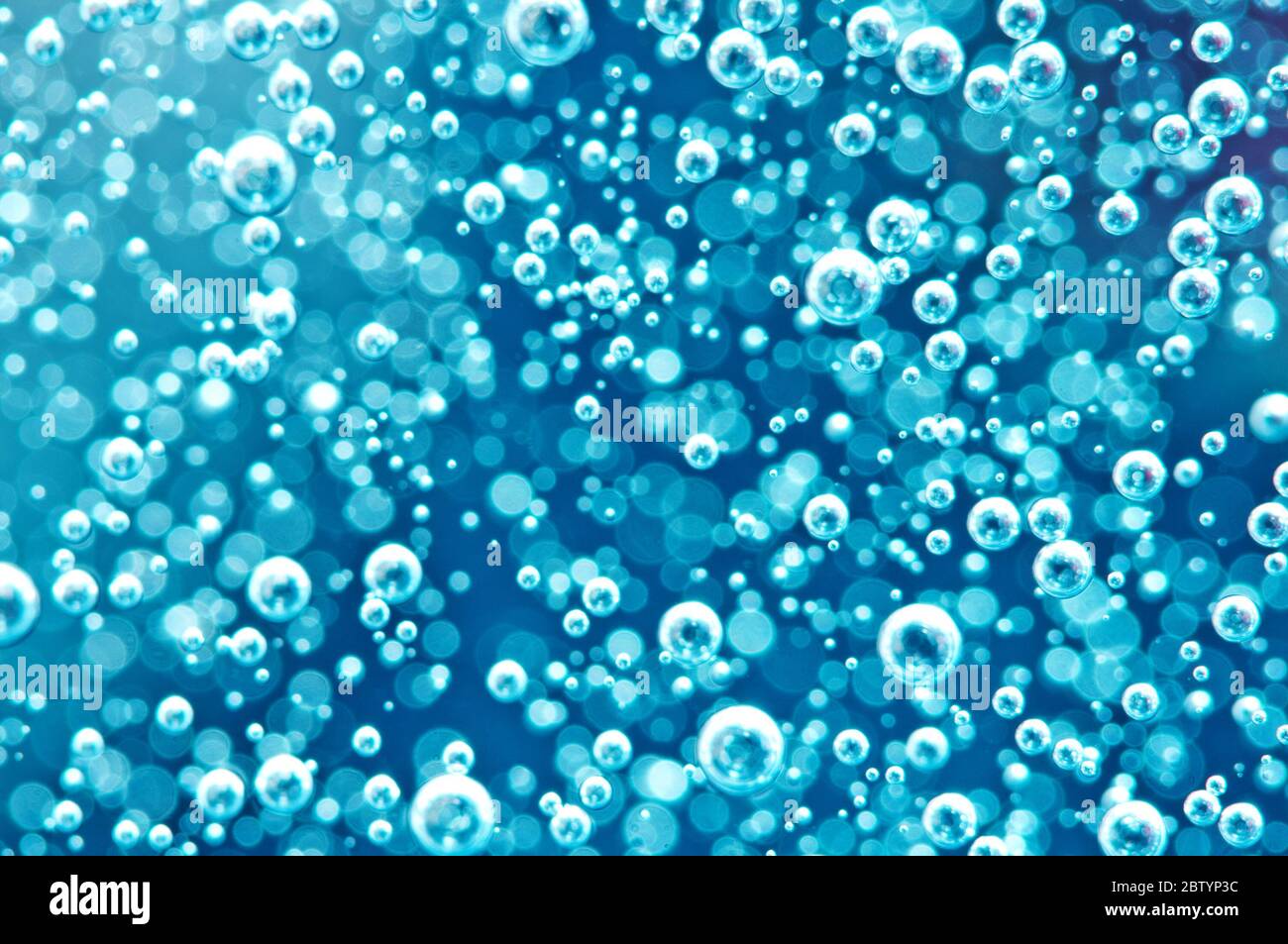 Macro Oxygen bubbles in water on blured background, concept such as ...