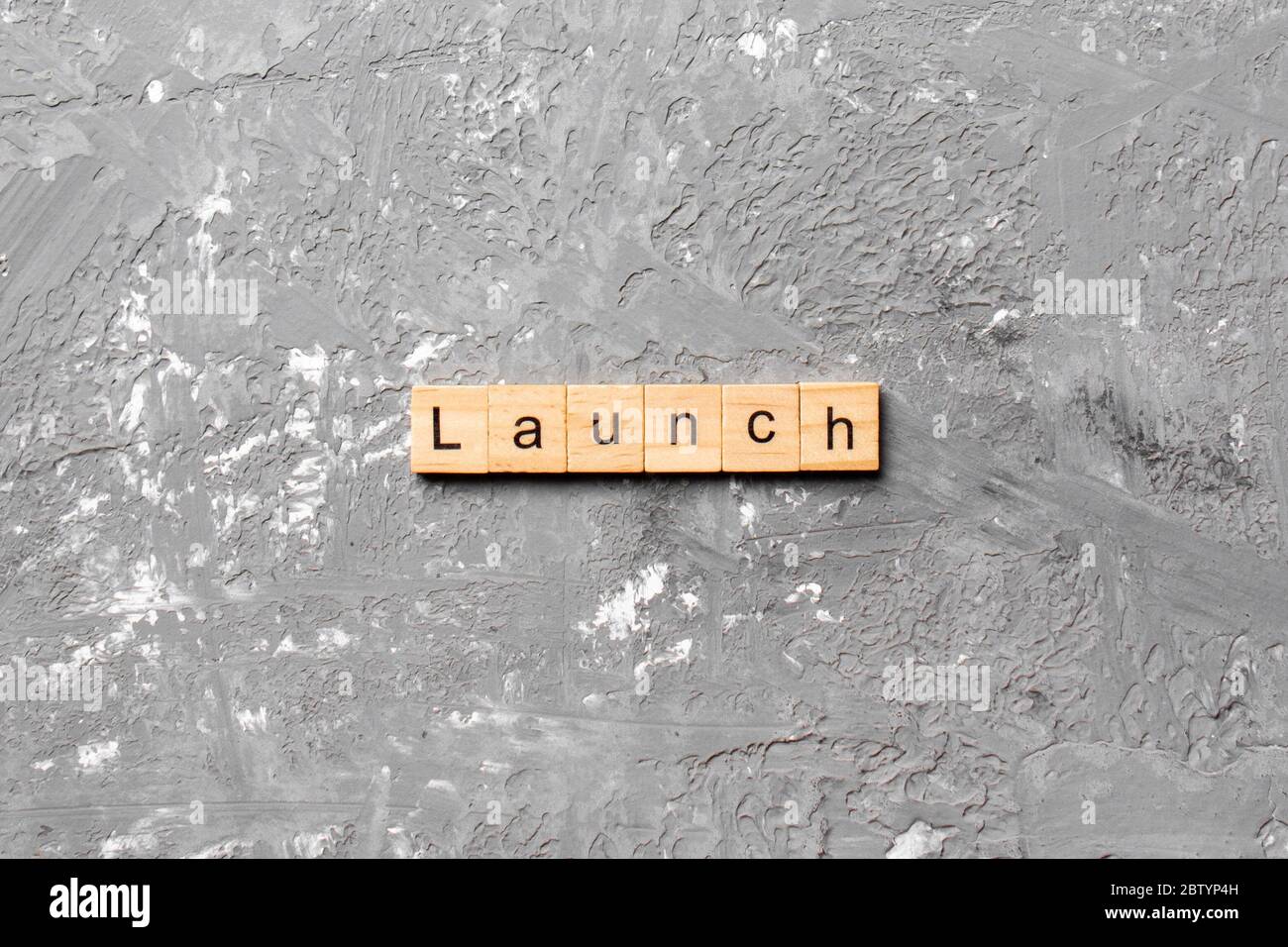 launch word written on wood block. launch text on table, concept Stock ...