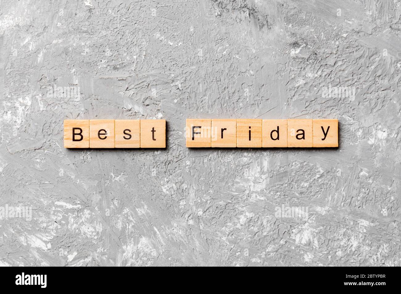 best friday word written on wood block. best friday text on cement ...