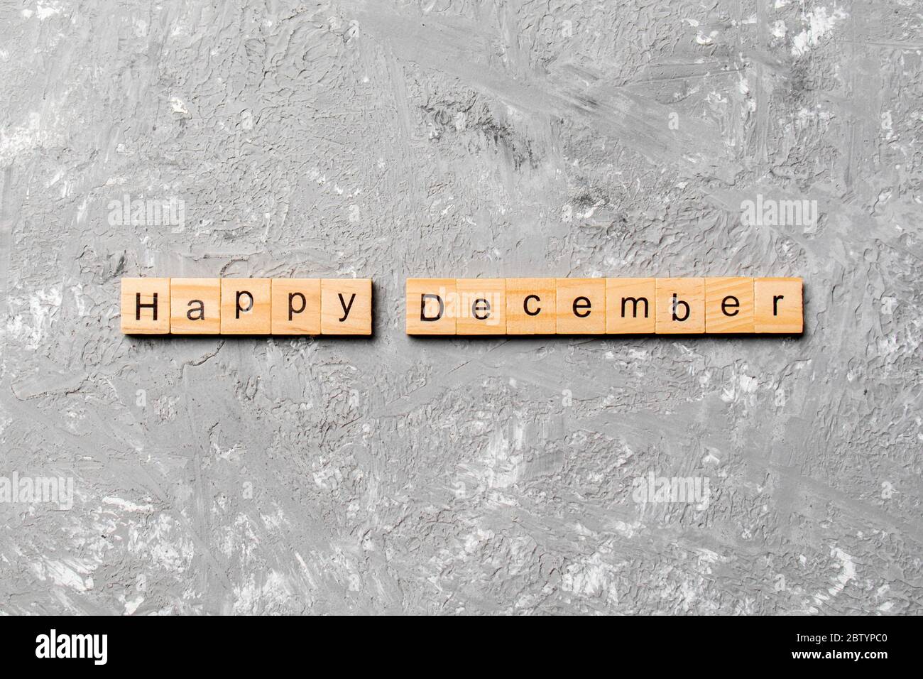 Happy december word written on wood block. Happy december text on table ...