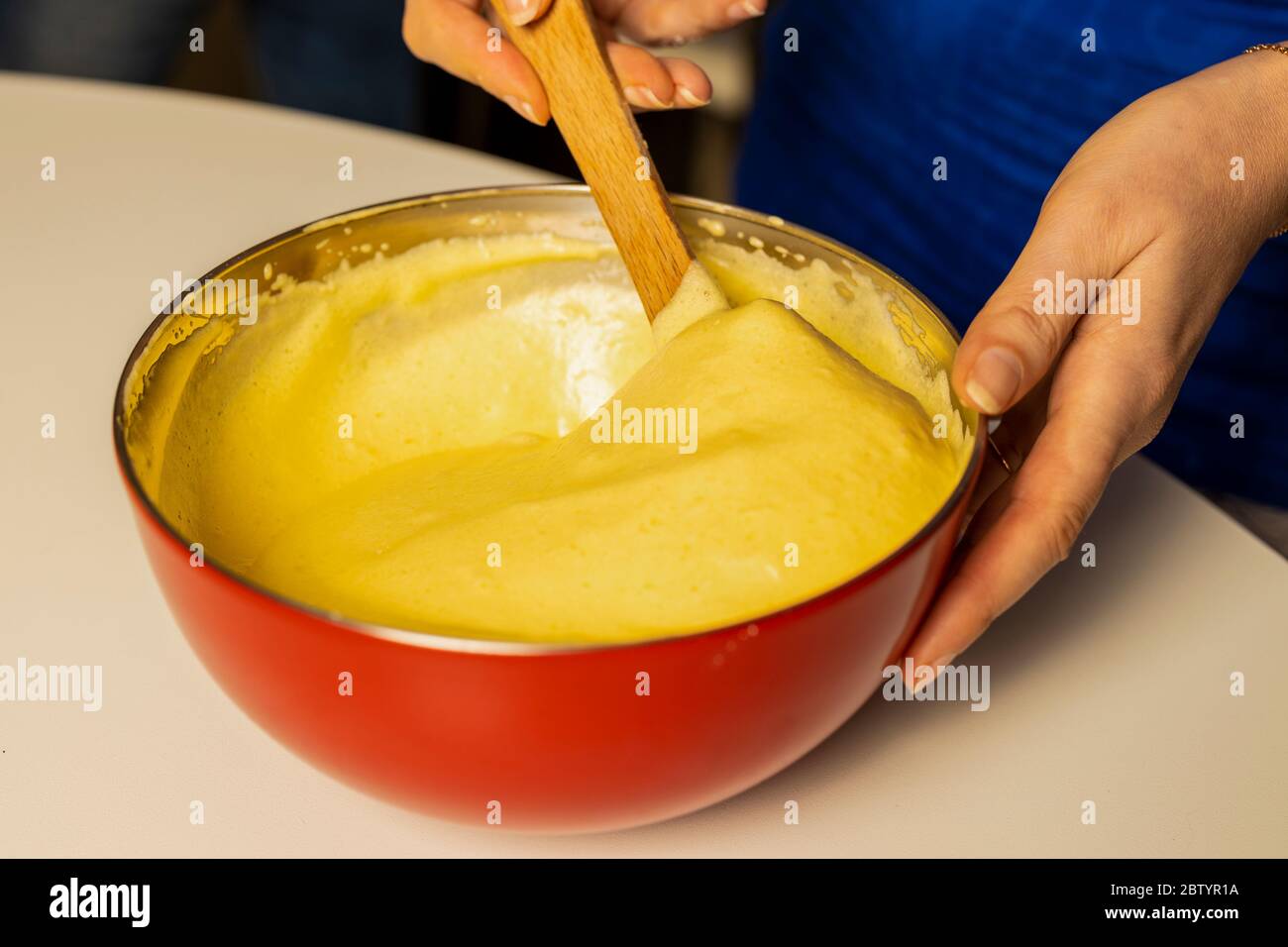 Add flour to the dough for a thicker consistency - baking Stock Photo ...