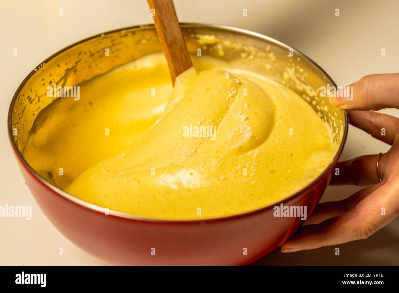 Add flour to the dough for a thicker consistency - baking Stock Photo ...