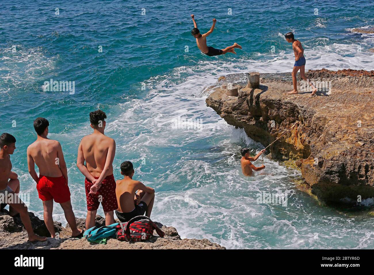 Beirut, Lebanon. 28th May, 2020. People enjoy swimming at the seaside ...