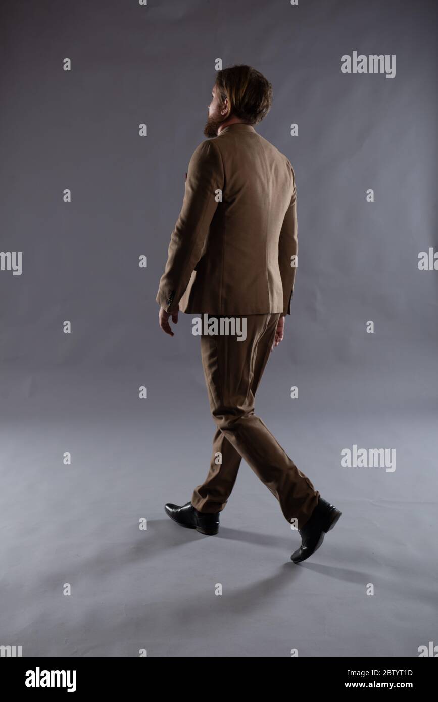 Detective man walking away hi-res stock photography and images - Alamy