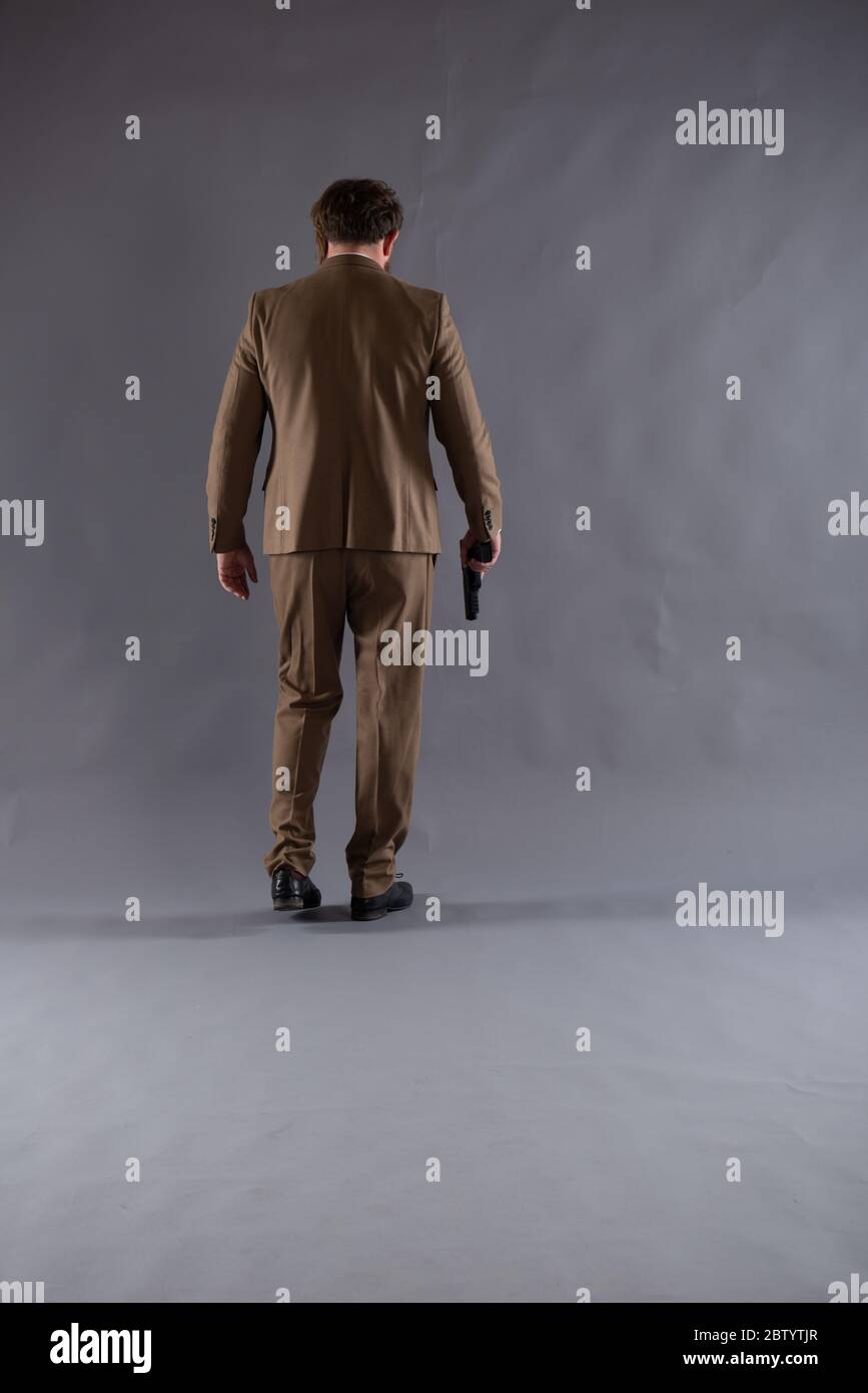 Detective man walking hi-res stock photography and images - Alamy