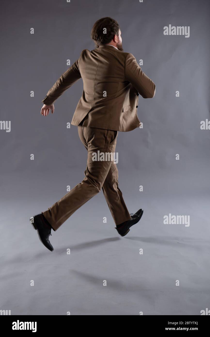 Man with gun running hi-res stock photography and images - Alamy