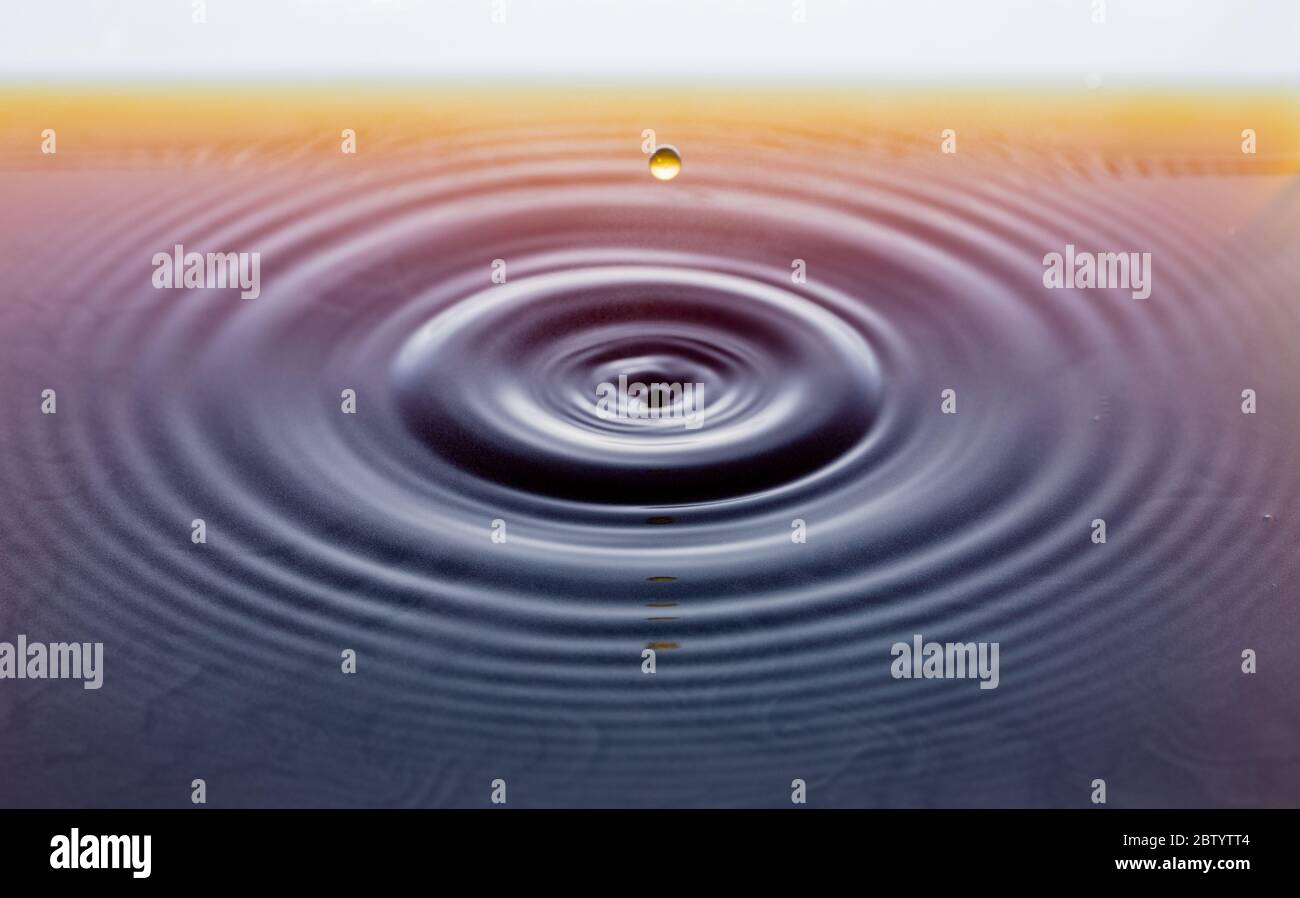 rippling after a few drops of coffee Stock Photo - Alamy