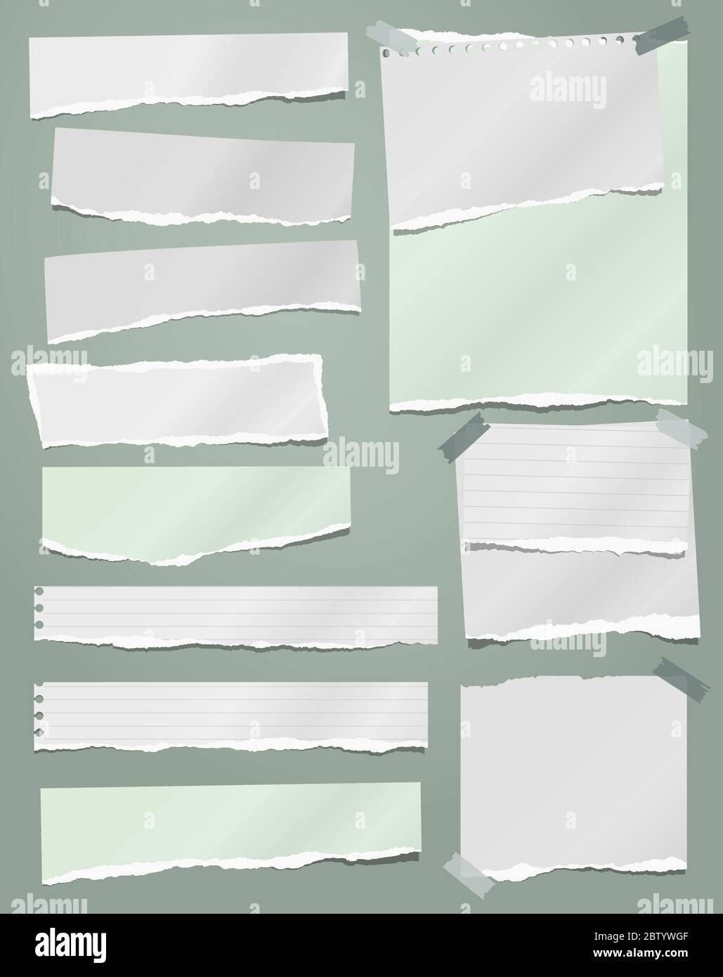 Torn white note, notebook paper strips and pieces stuck on green ...