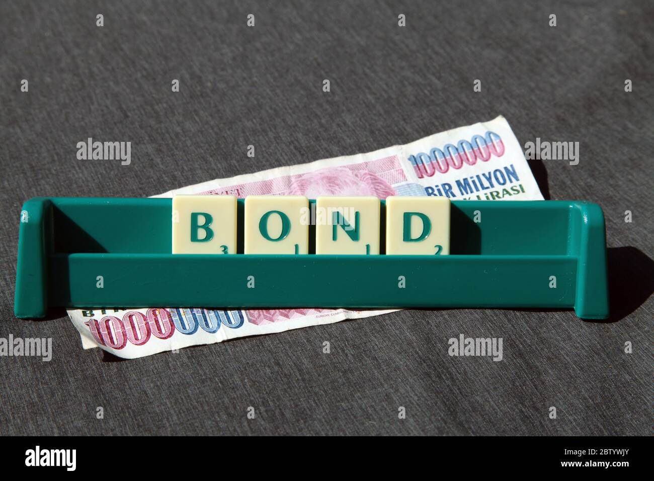 Turkish Lira Bond spelt in scrabble letters, 1 million lira note, 1 BiR ...