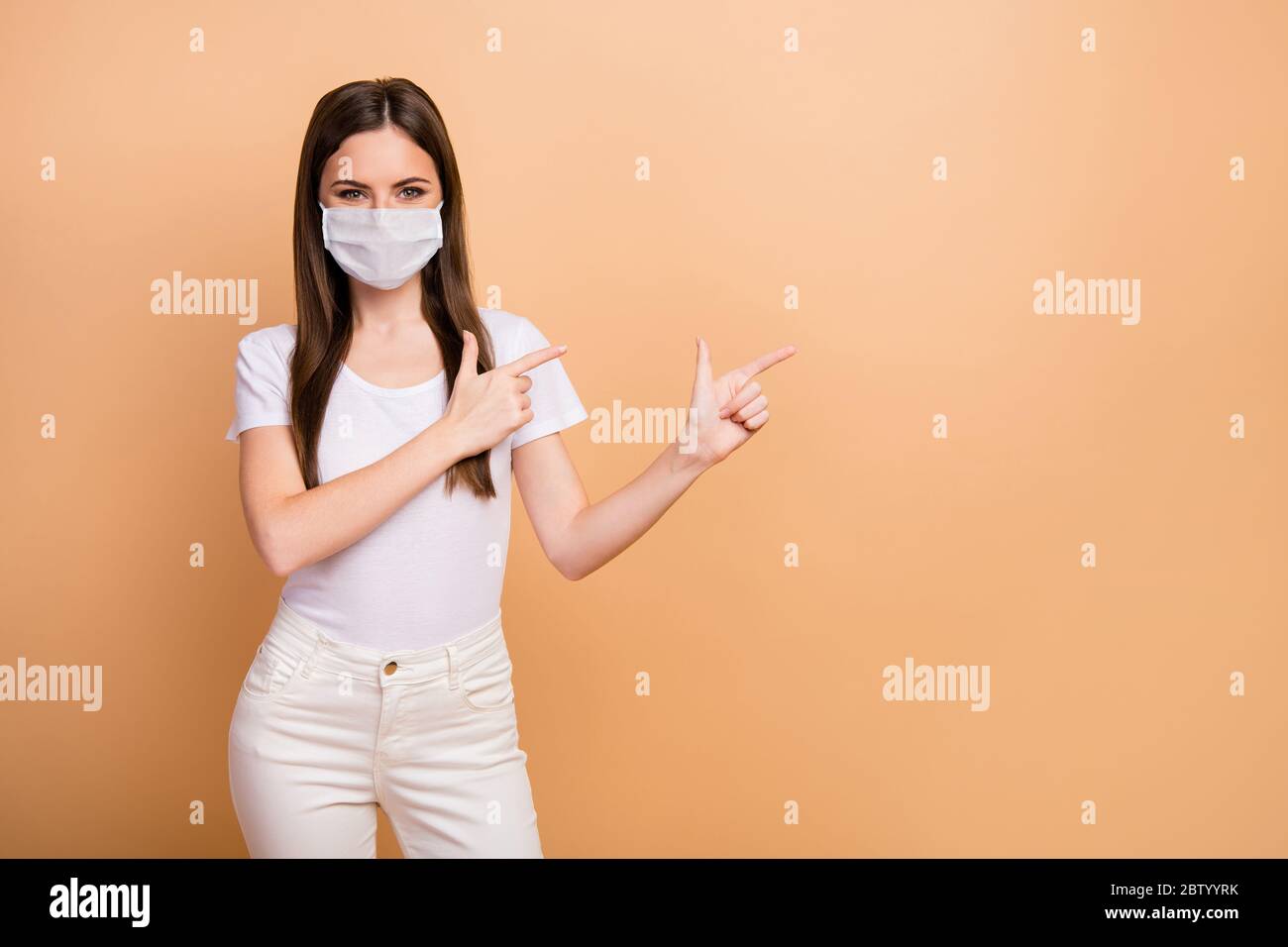 Portrait of positive cheerful girl promoter present ads pick tips promo ...