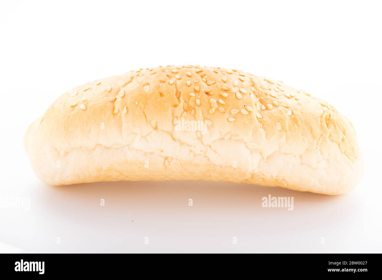 White dough bun with sesame seeds. Bun for breakfast. Side view Stock ...