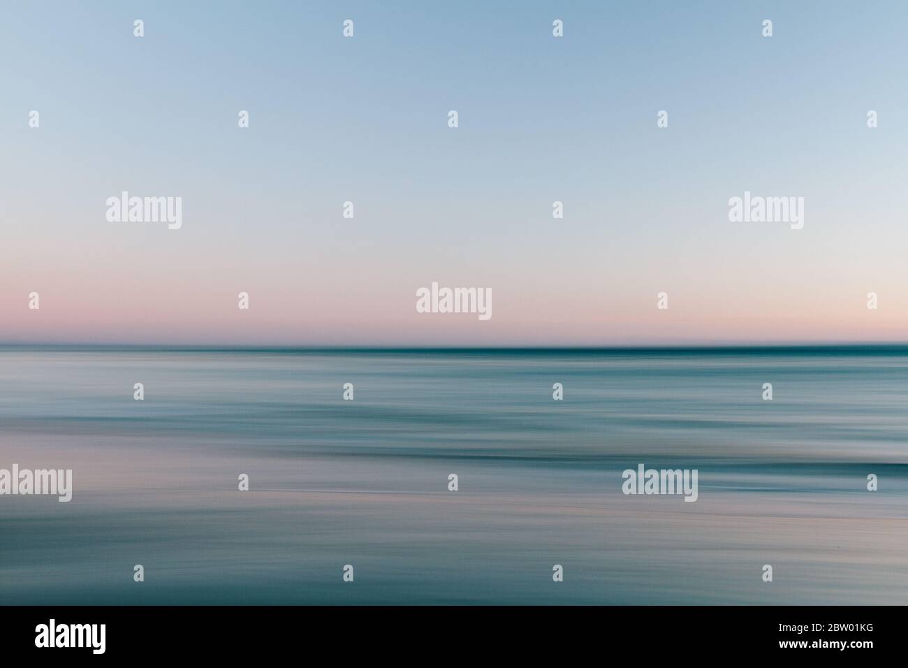 Cool ocean texture horizon line at sunset Stock Photo - Alamy
