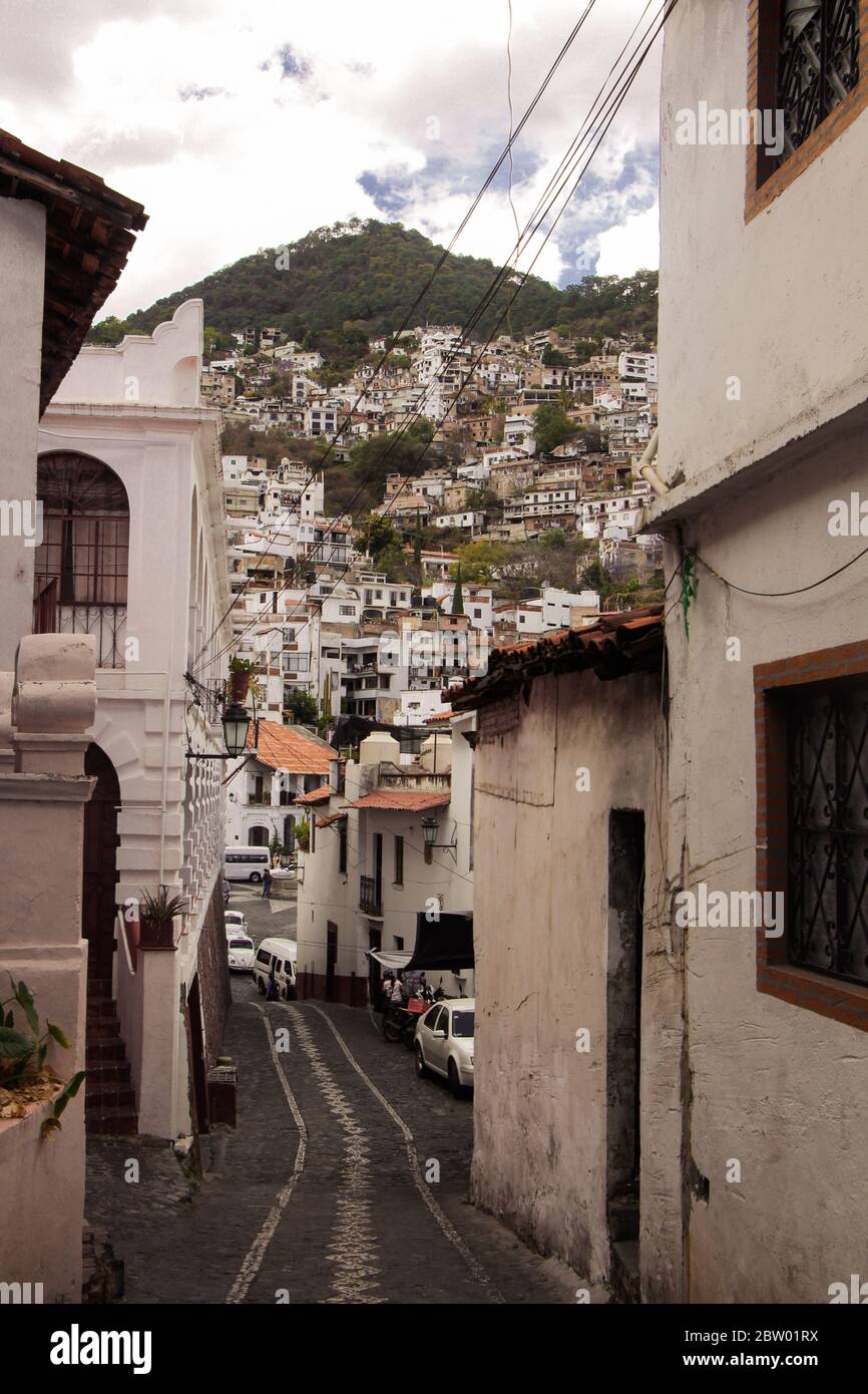 Mexican Streets of the City of Taxco with view on the hill of the ...