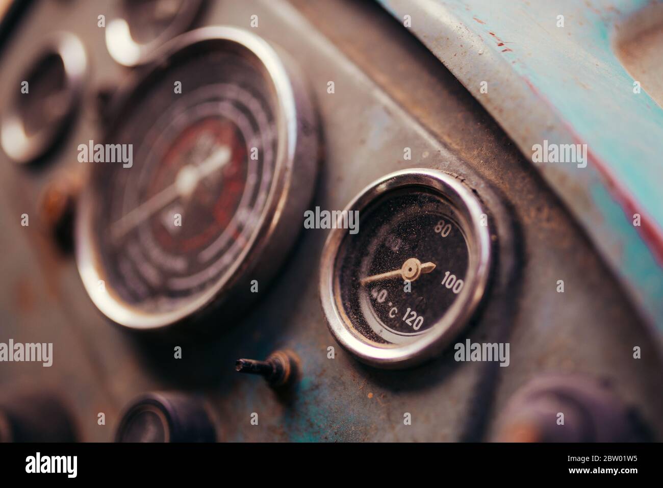 Old tractor dashboard. Temperature scale closeup Stock Photo - Alamy