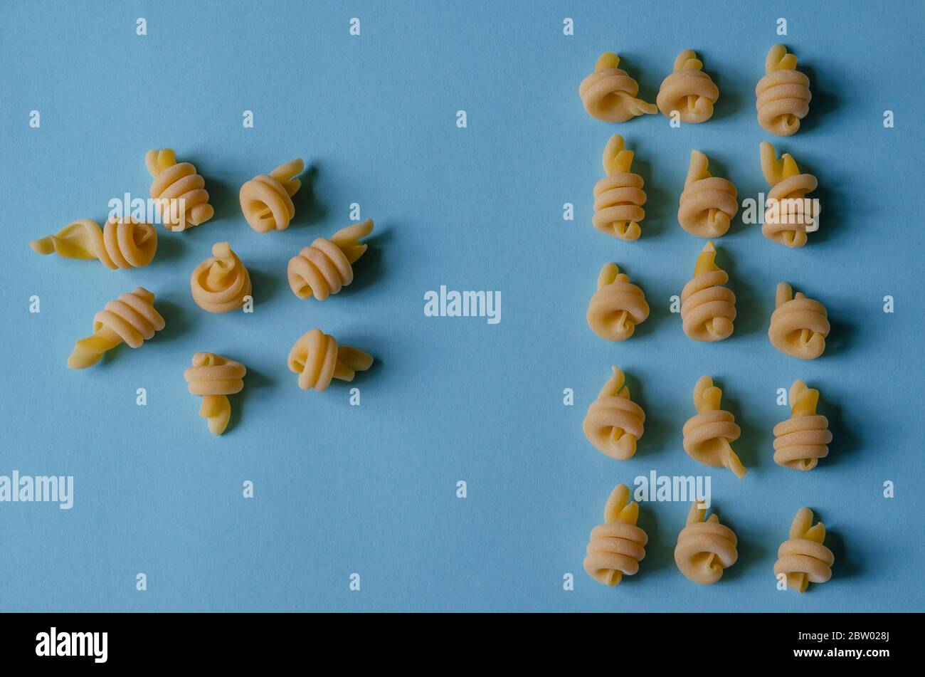 Creative background with insalatonde pasta on a light blue background ...