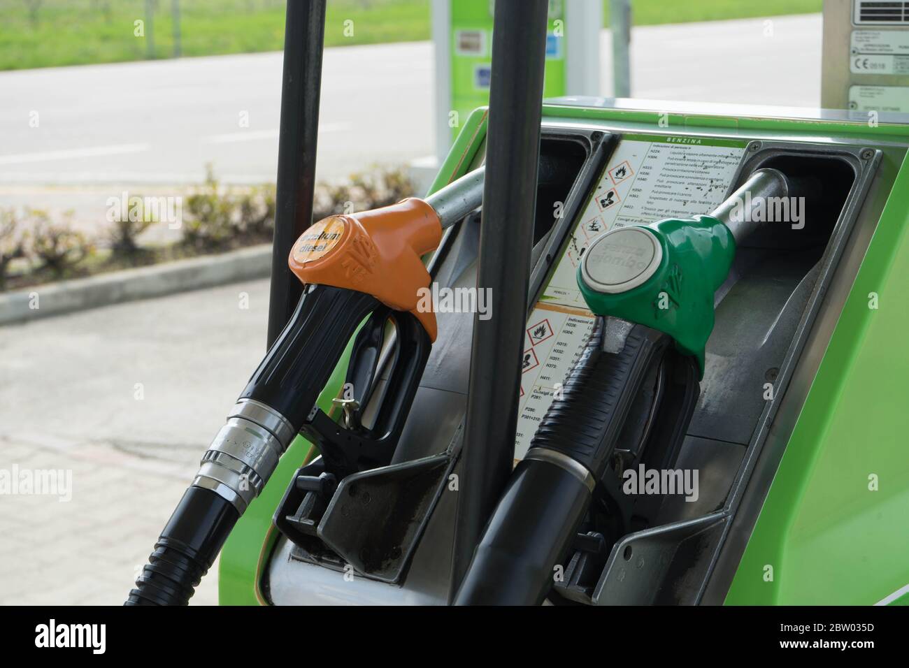 Guns of a petrol pump Stock Photo - Alamy