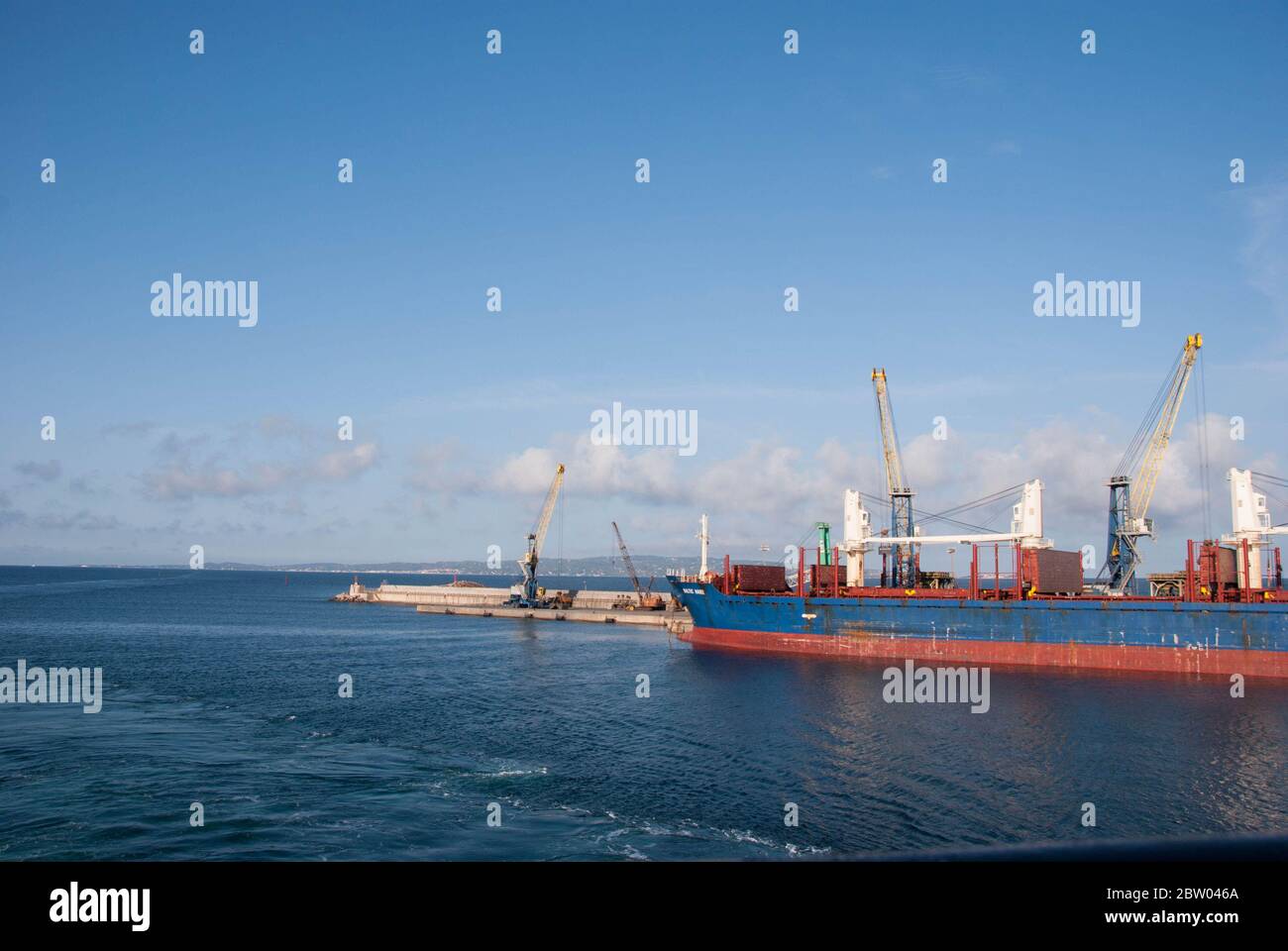 View of the port of Portoscuso, Sardinia - Italy Stock Photo - Alamy