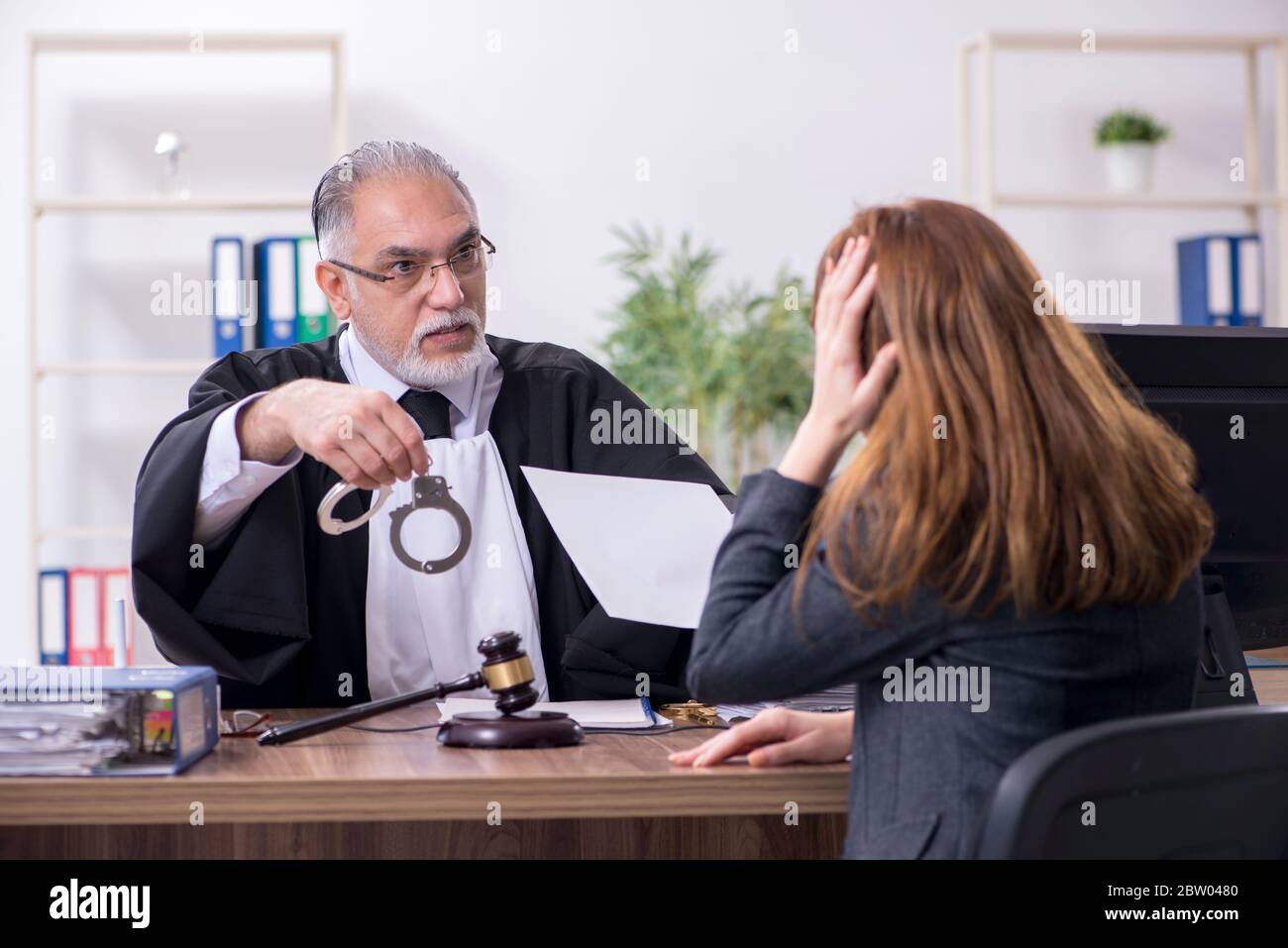 Female judge handcuffs hi-res stock photography and images - Alamy