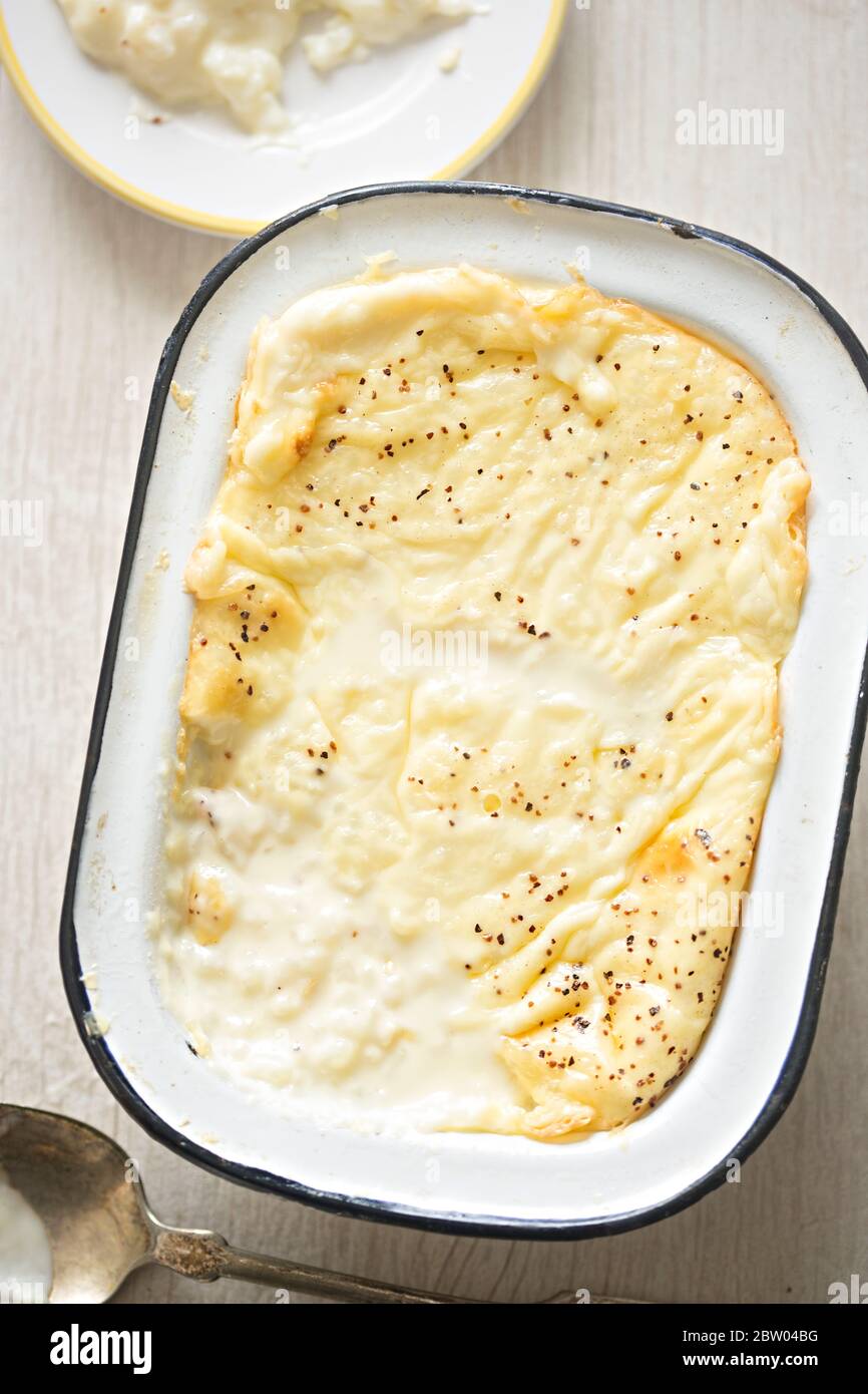 Clotted cream rice pudding with nutmeg Stock Photo - Alamy