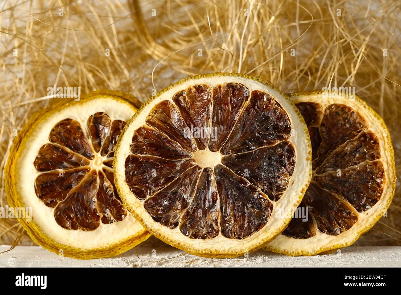 Three aromatic slices of dried citrus fruit Stock Photo - Alamy