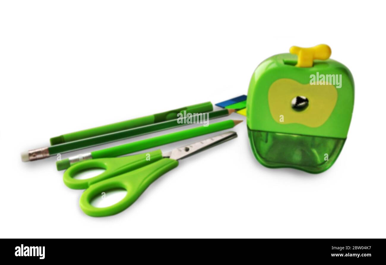 stationery green color. mechanical sharpener and pencil. writing ...