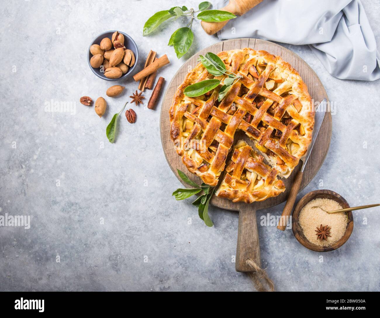 Apple pie with lattice top on wooden background, table top view. Rustic ...