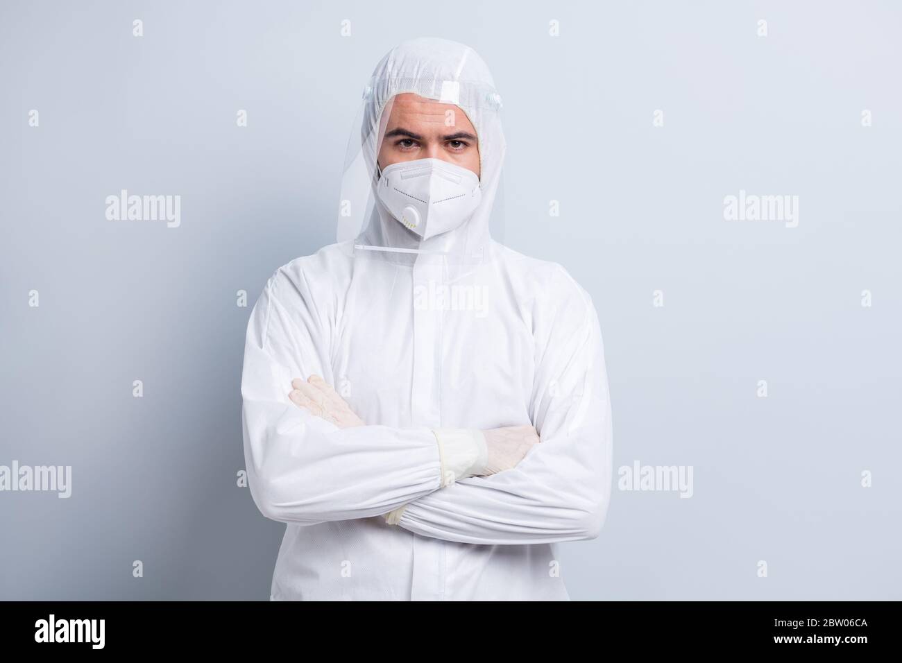 Photo of serious guy expert doc virology center clinic arms crossed ...