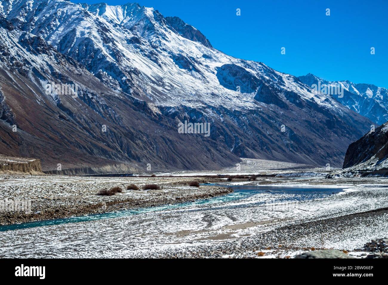 Nubra Valley in Ladakh India. White snow on the blue mountains of ...