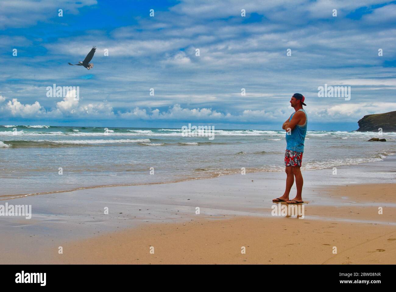 Man on the beautiful beach in Cornwall Stock Photo - Alamy