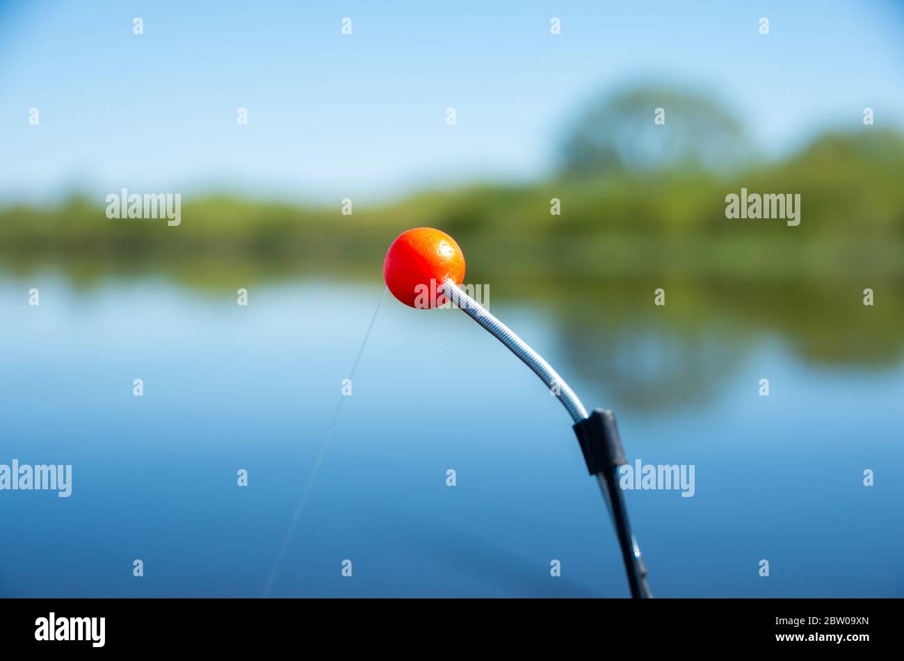 Orange float for fishing, sensitivity if the fish is catch, river Stock ...