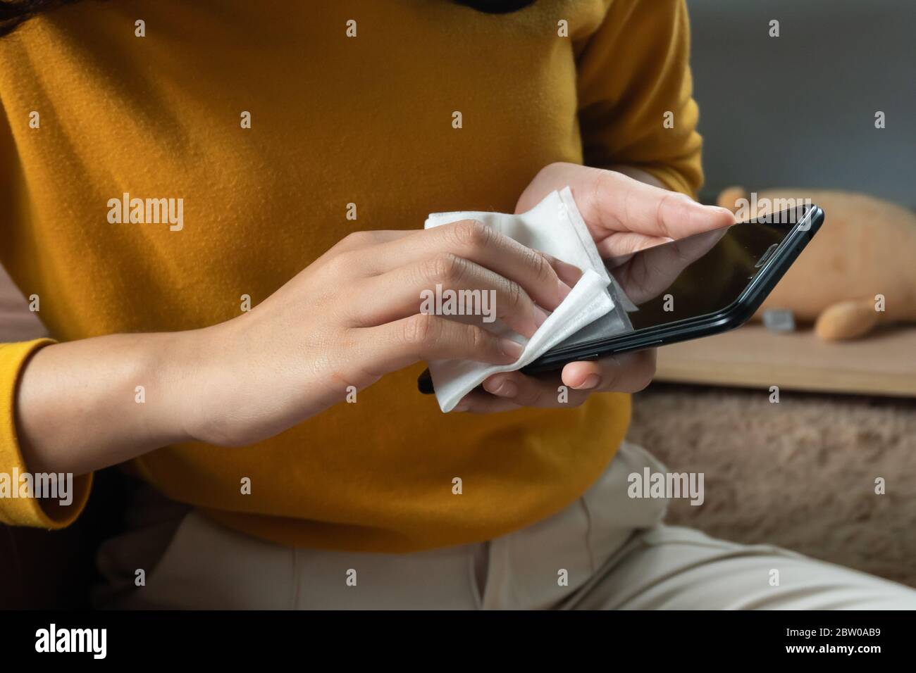 Cleaning the smartphone screen with a fiber cloth From dust and viruses ...
