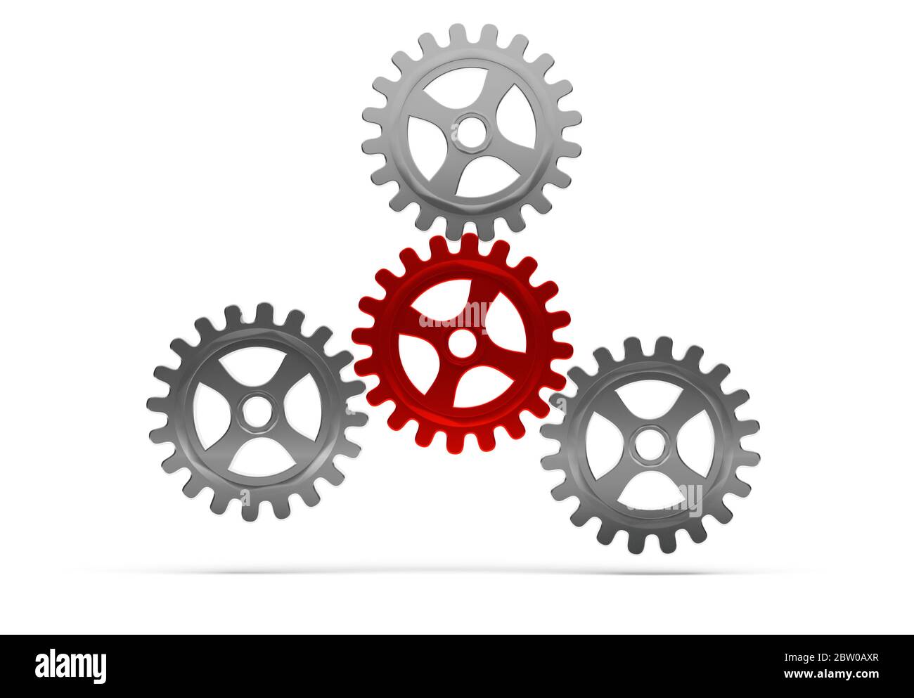 Three metal cogwheel gears attached to a central red wheel over white ...