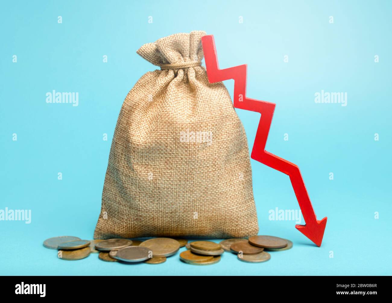 Money bag and red arrow down. Economic difficulties. Stagnation ...