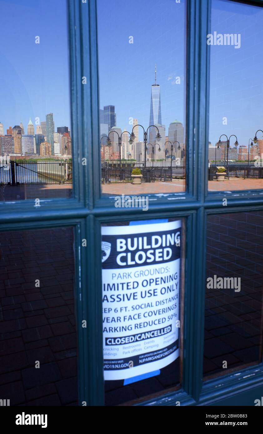 A building closed note posting inside the window of former Central ...