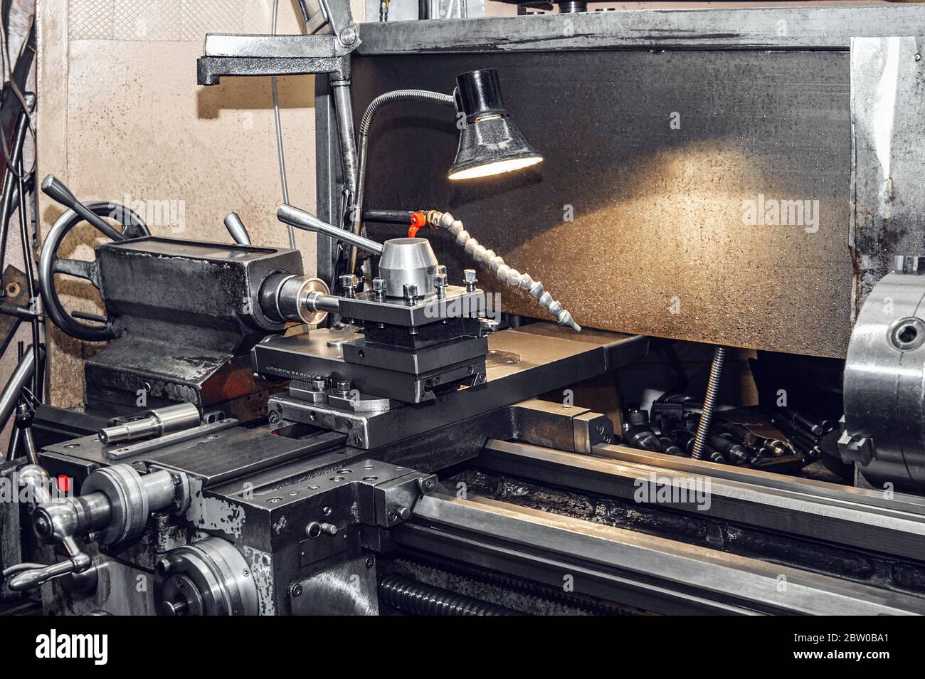 old Metalworking machine is working. Turning production. Using old ...