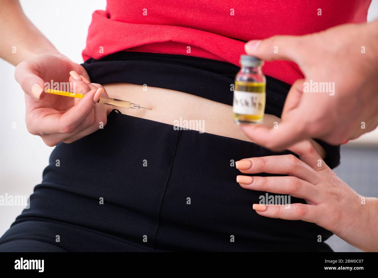 Female diabetic patient visiting young doctor Stock Photo - Alamy