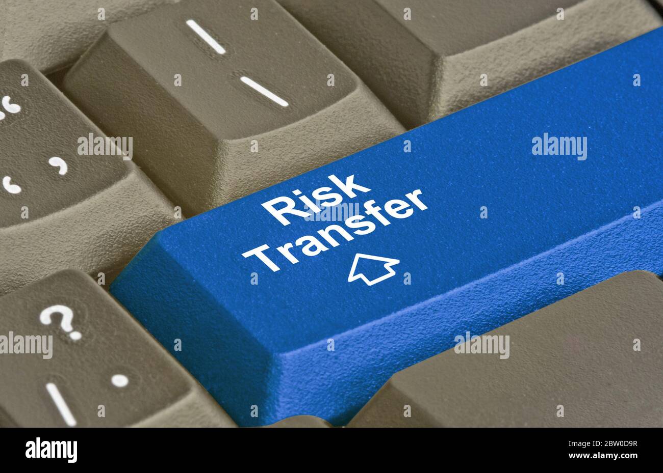 Keyboard with key for risk transfer Stock Photo - Alamy